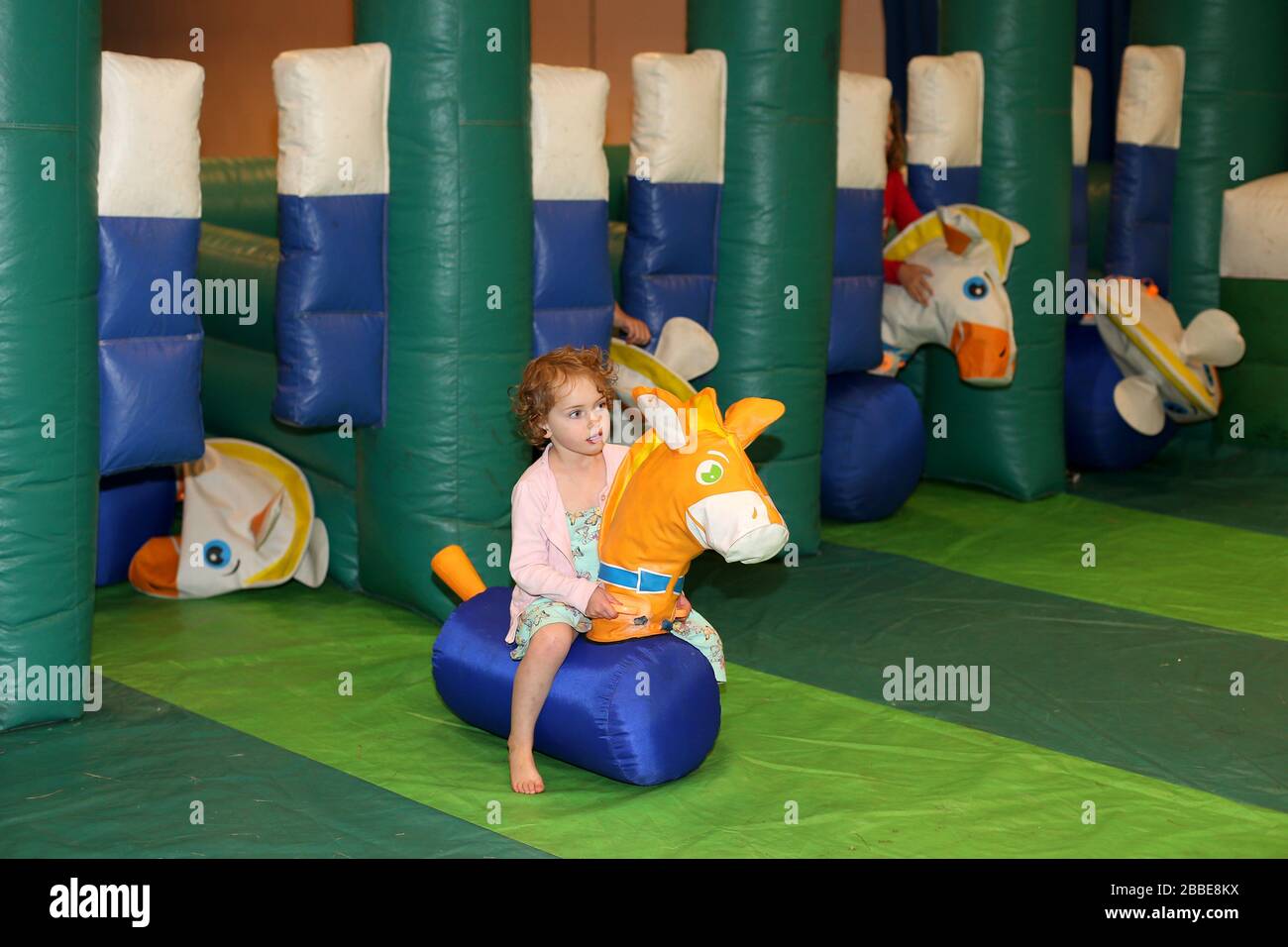 A children's activity inside at Sandown Park Racecourse Stock Photo - Alamy