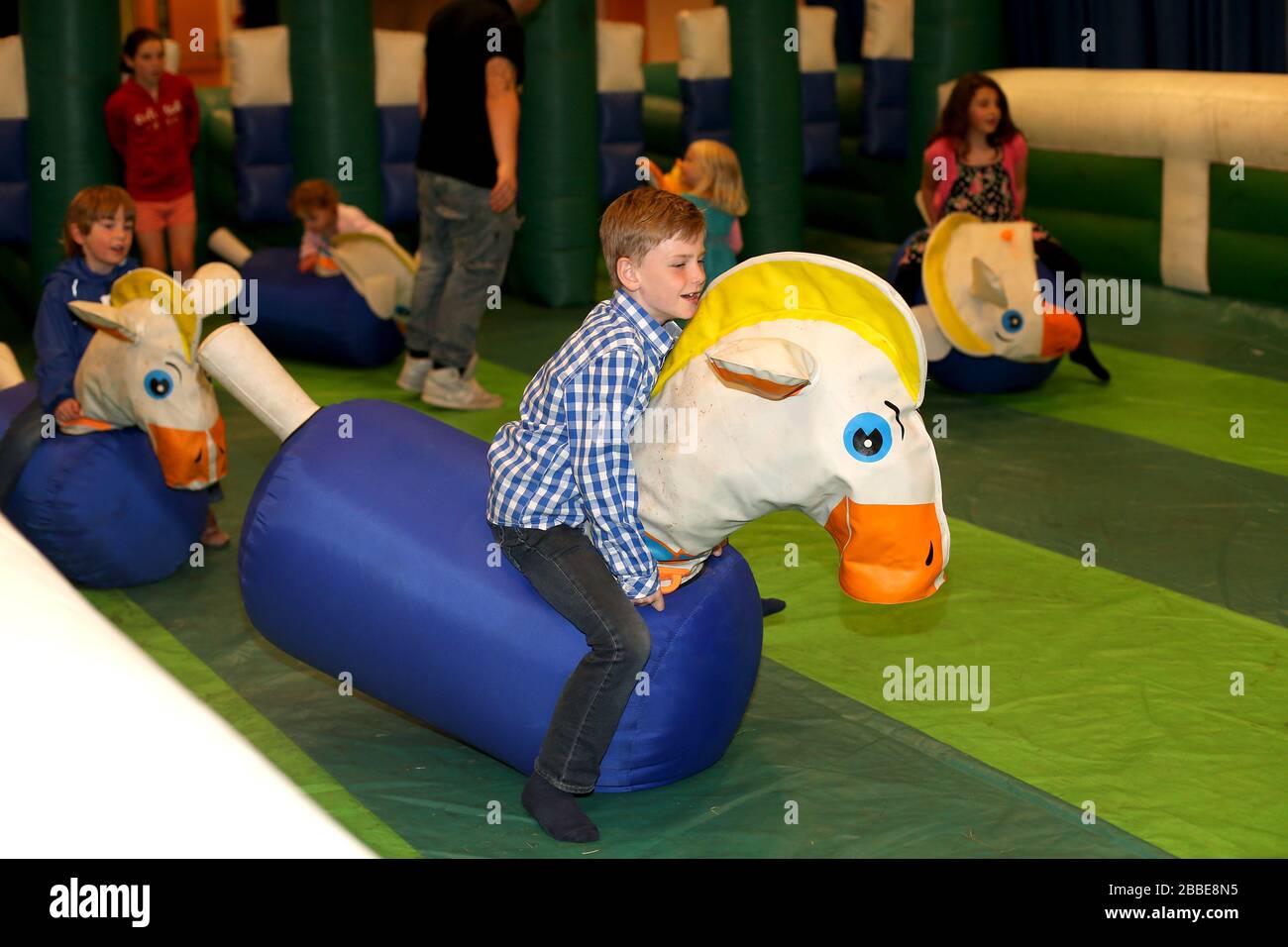 A children's activity inside at Sandown Park Racecourse Stock Photo - Alamy
