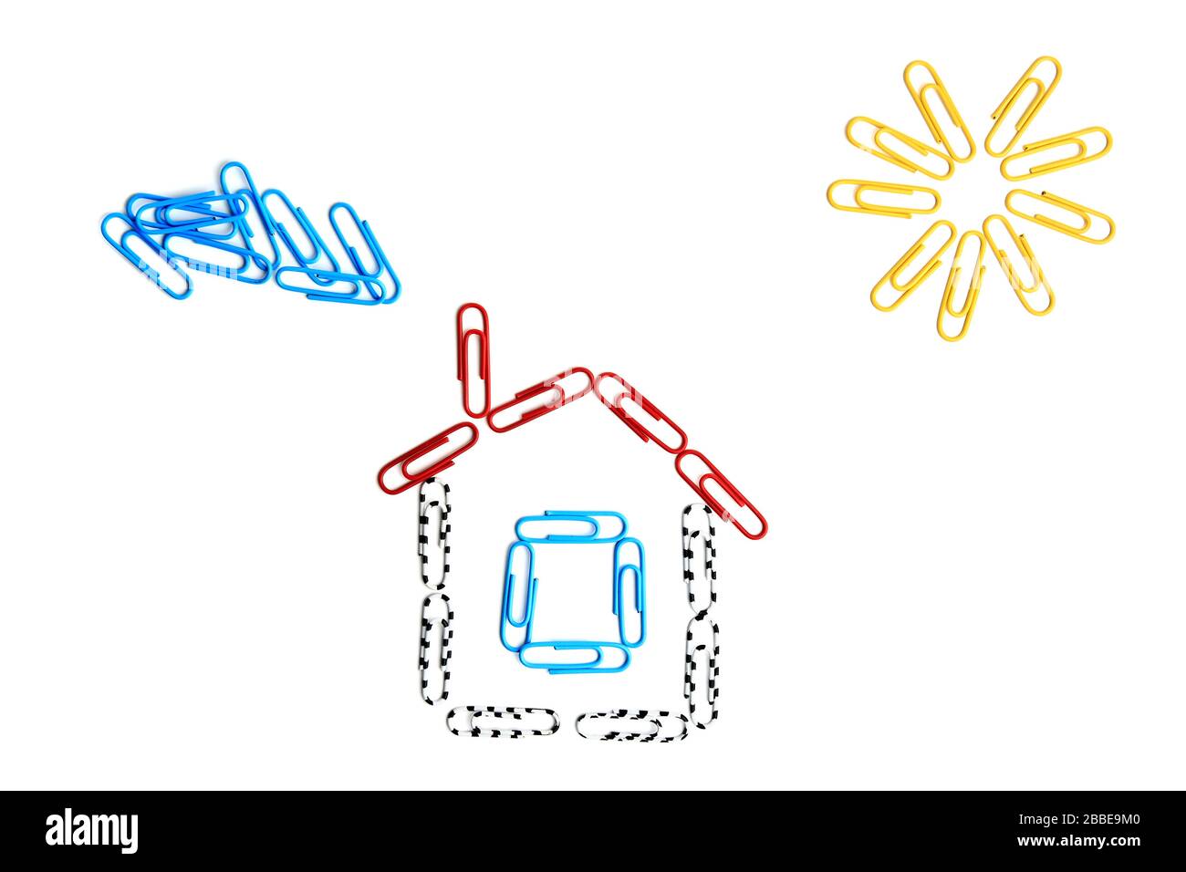 Paper clips house on the isolated backgroun Stock Photo - Alamy