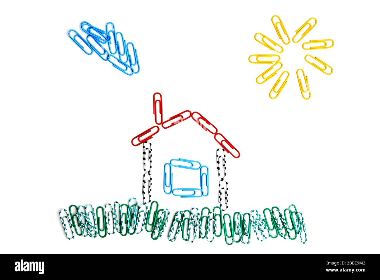 Paper clips house on the isolated backgroun Stock Photo - Alamy