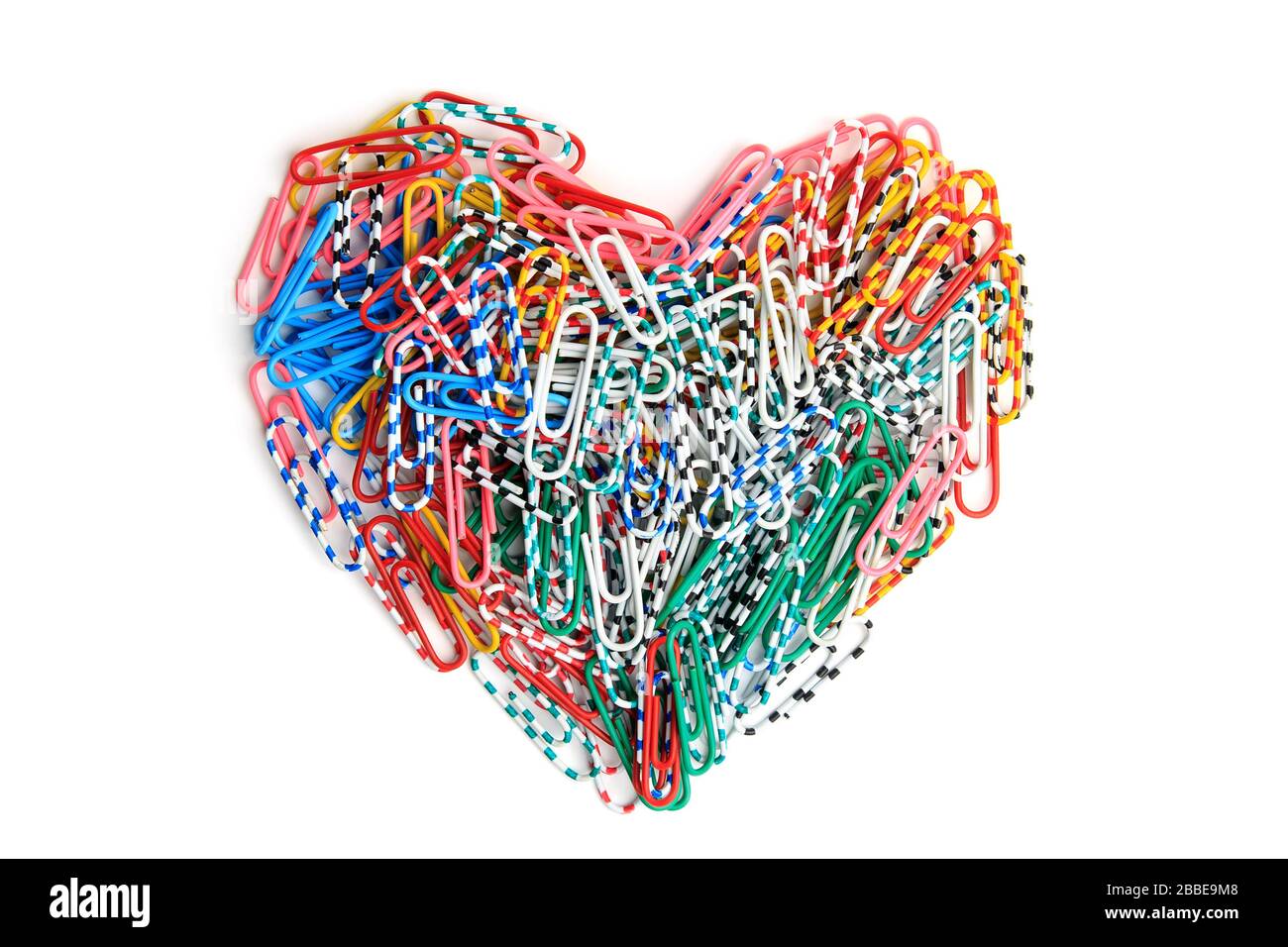 Paper clips heart on the isolated background Stock Photo - Alamy