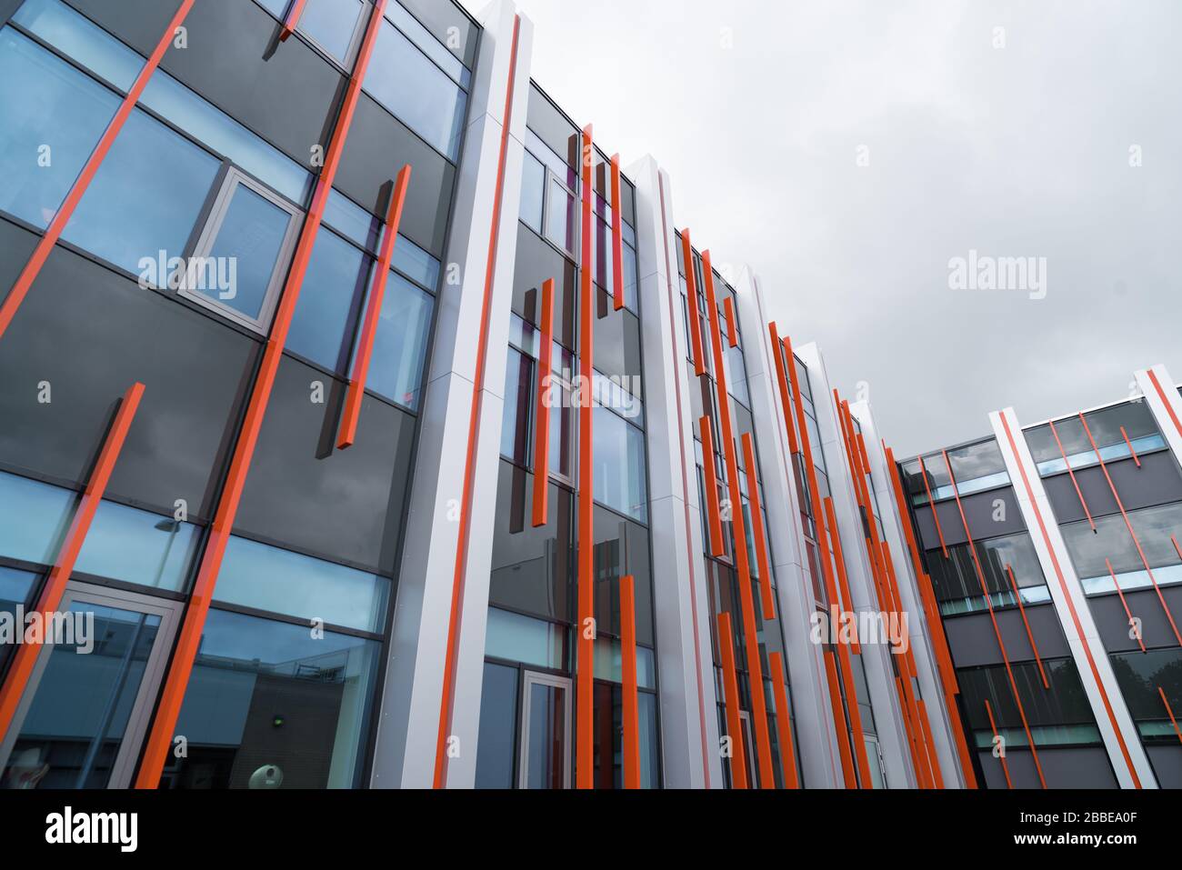 exterior of a modern office building with some orange accents Stock ...