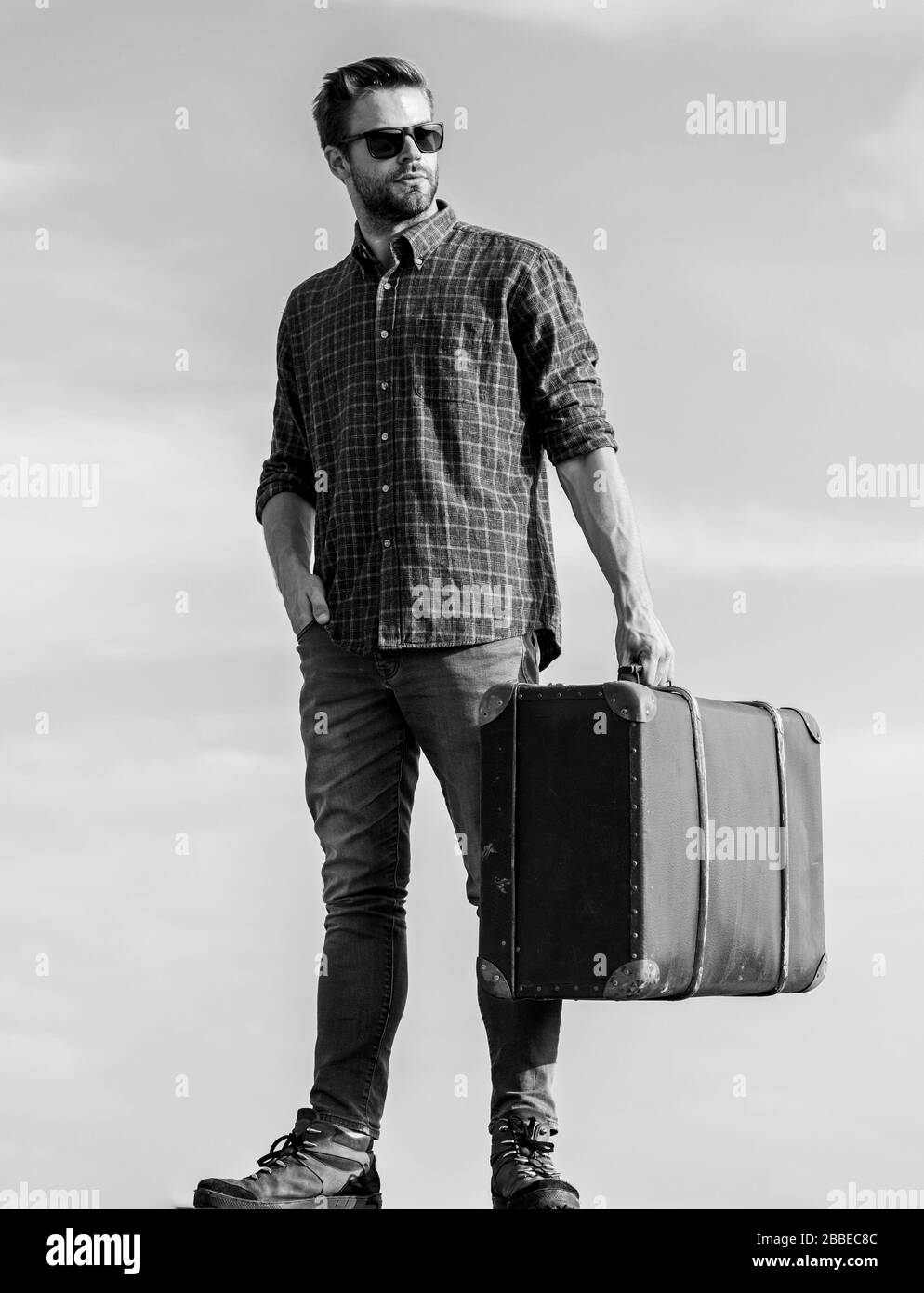 Travel with luggage. Travel blogger. Man carrying his things in baggage ...