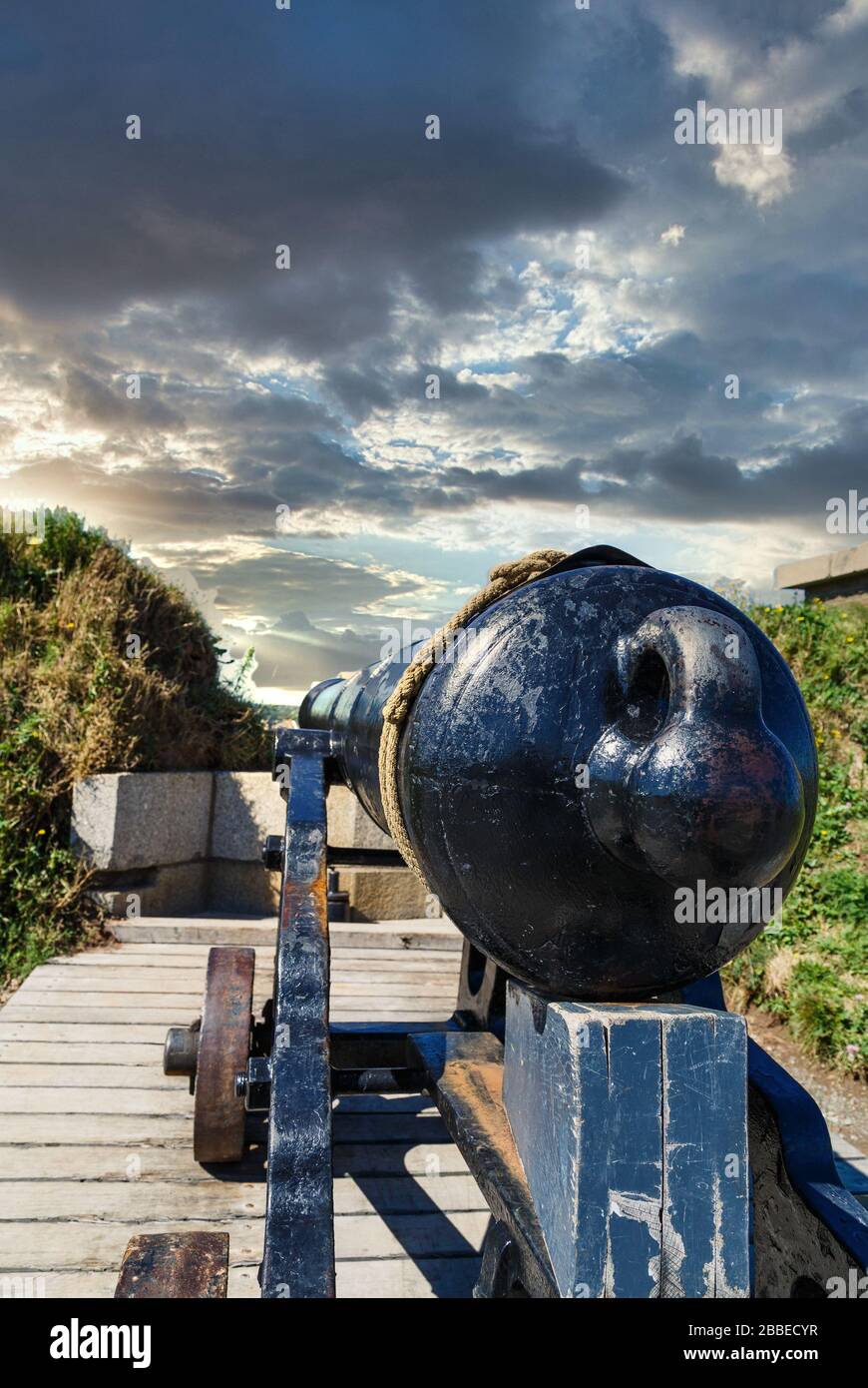 Aiming Down Old Cannon at Sunset Stock Photo - Alamy