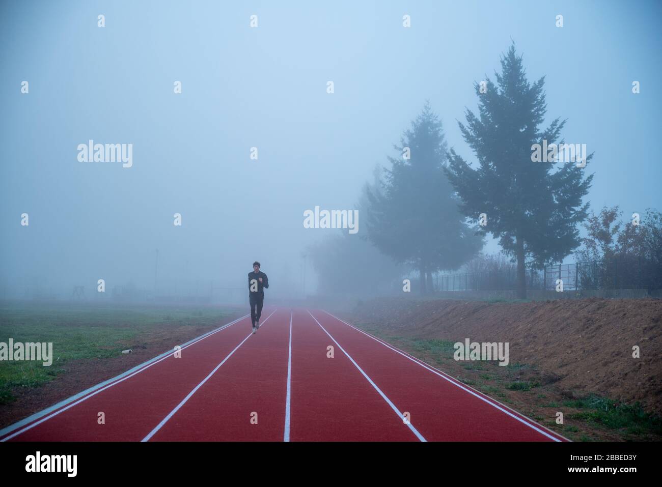 Active life, athlete run in misty morning at red athletics or running ...