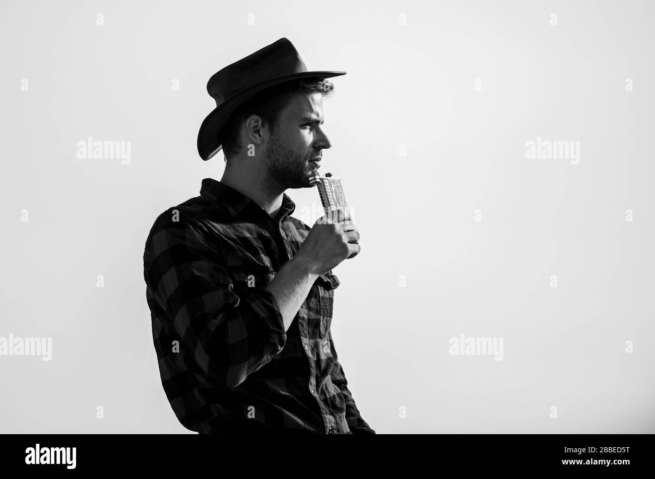 where my soul is. wild west rodeo. Thoughtful man in hat drink whiskey ...