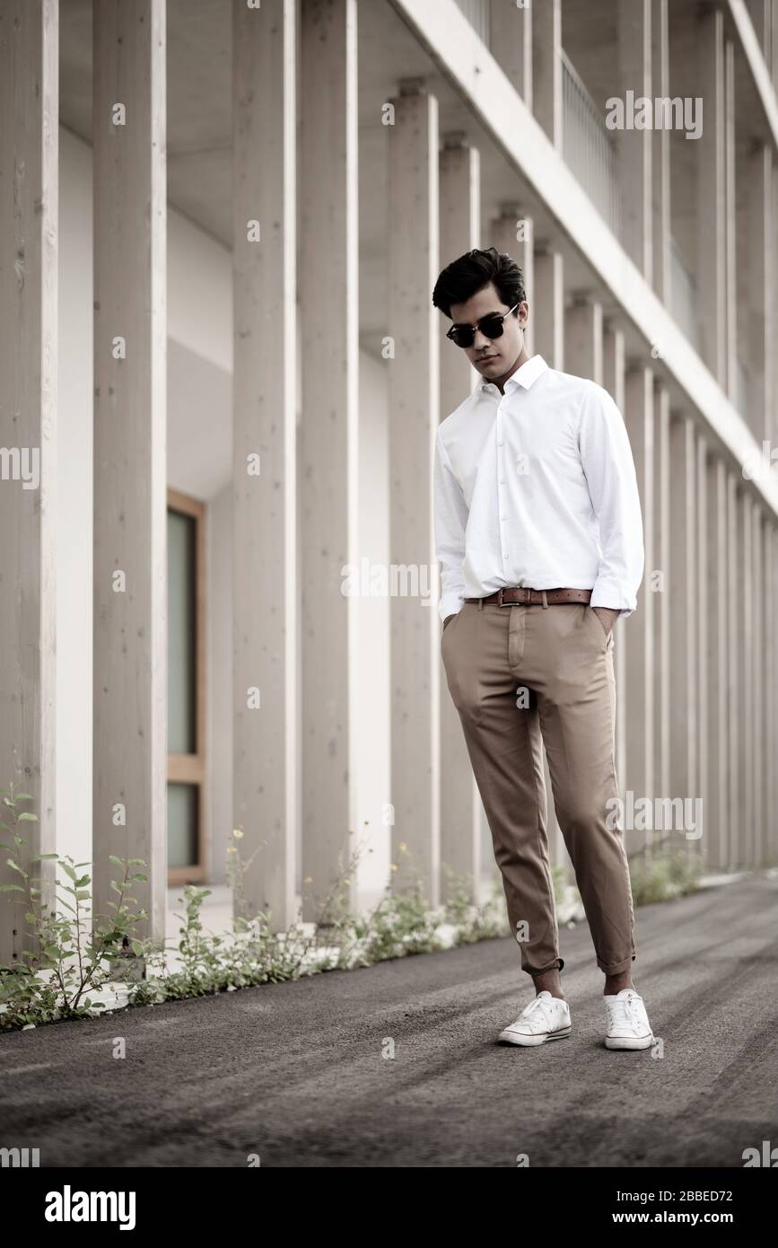 Attractive indian young man portrait hi-res stock photography and ...