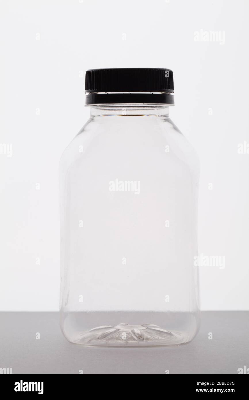 clean, empty plastic bottle on white background Stock Photo - Alamy