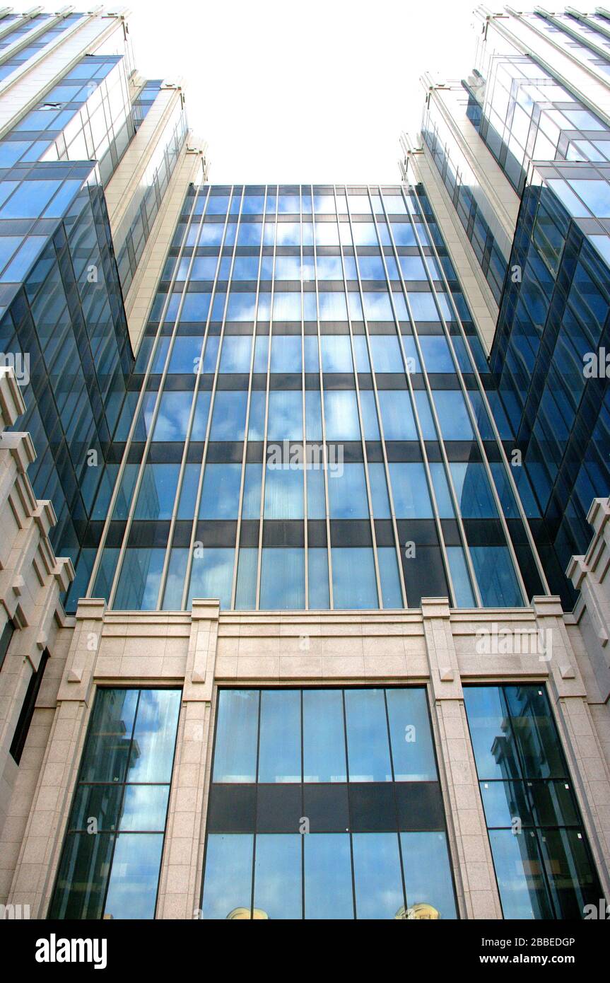 modern glass fronted building, offices. Sky reflection Stock Photo - Alamy
