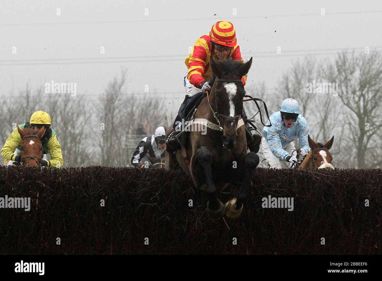 Race winner Trojan Sun ridden by Felix De Giles in jumping action in ...