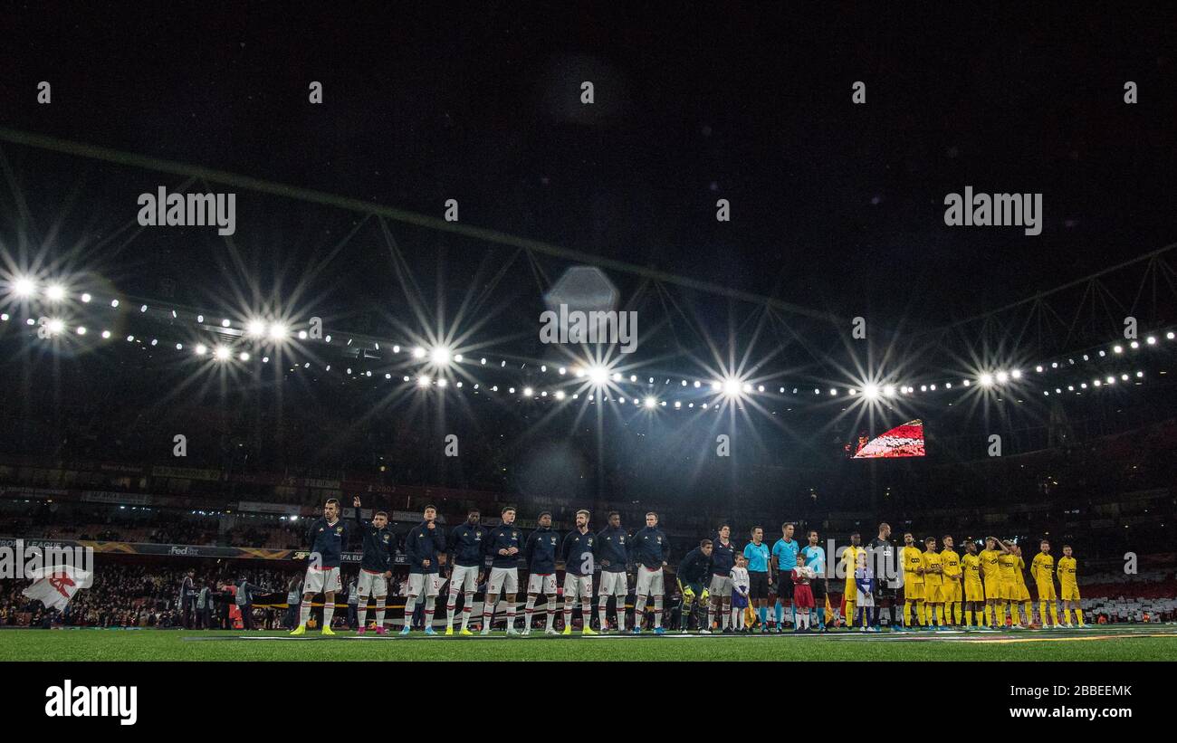 LONDON, ENGLAND - OCTOBER 03: teams line up ahead of the UEFA Europa ...