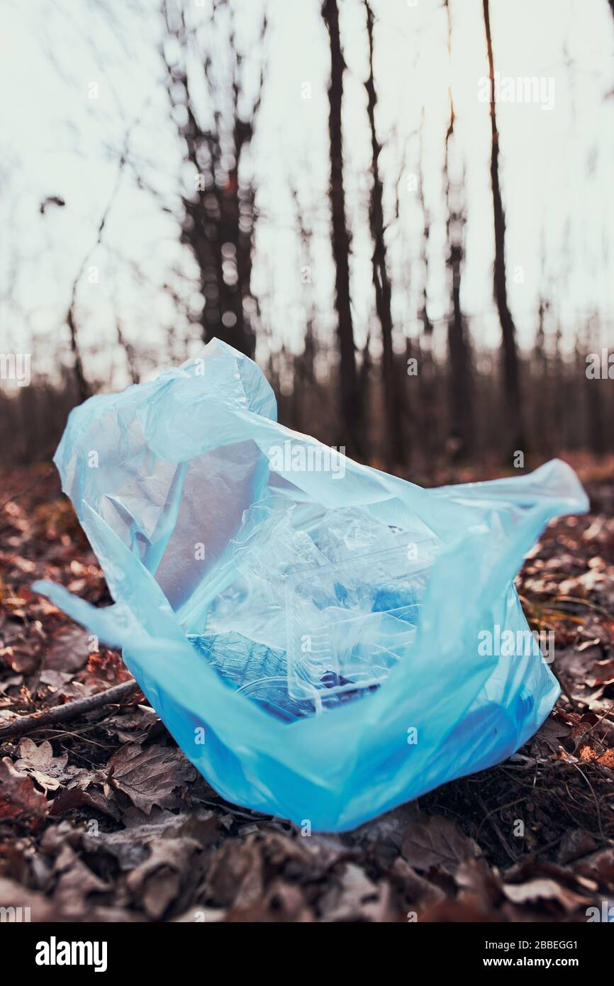 Plastic waste left in forest. Concept of plastic pollution and ...
