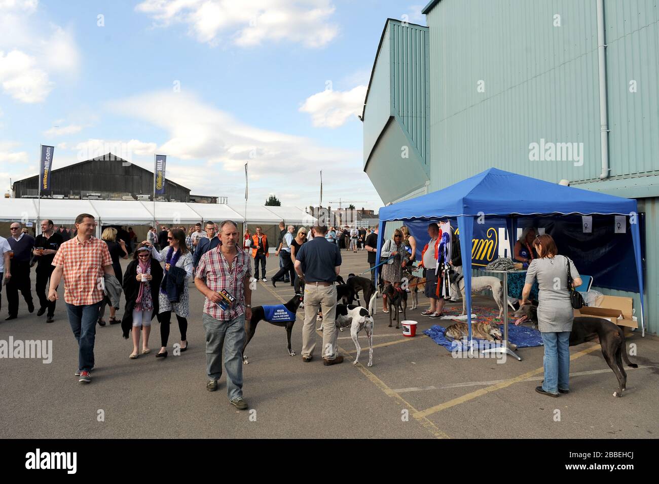 Spectators outside Wimbledon Stadium before the racing Stock Photo - Alamy