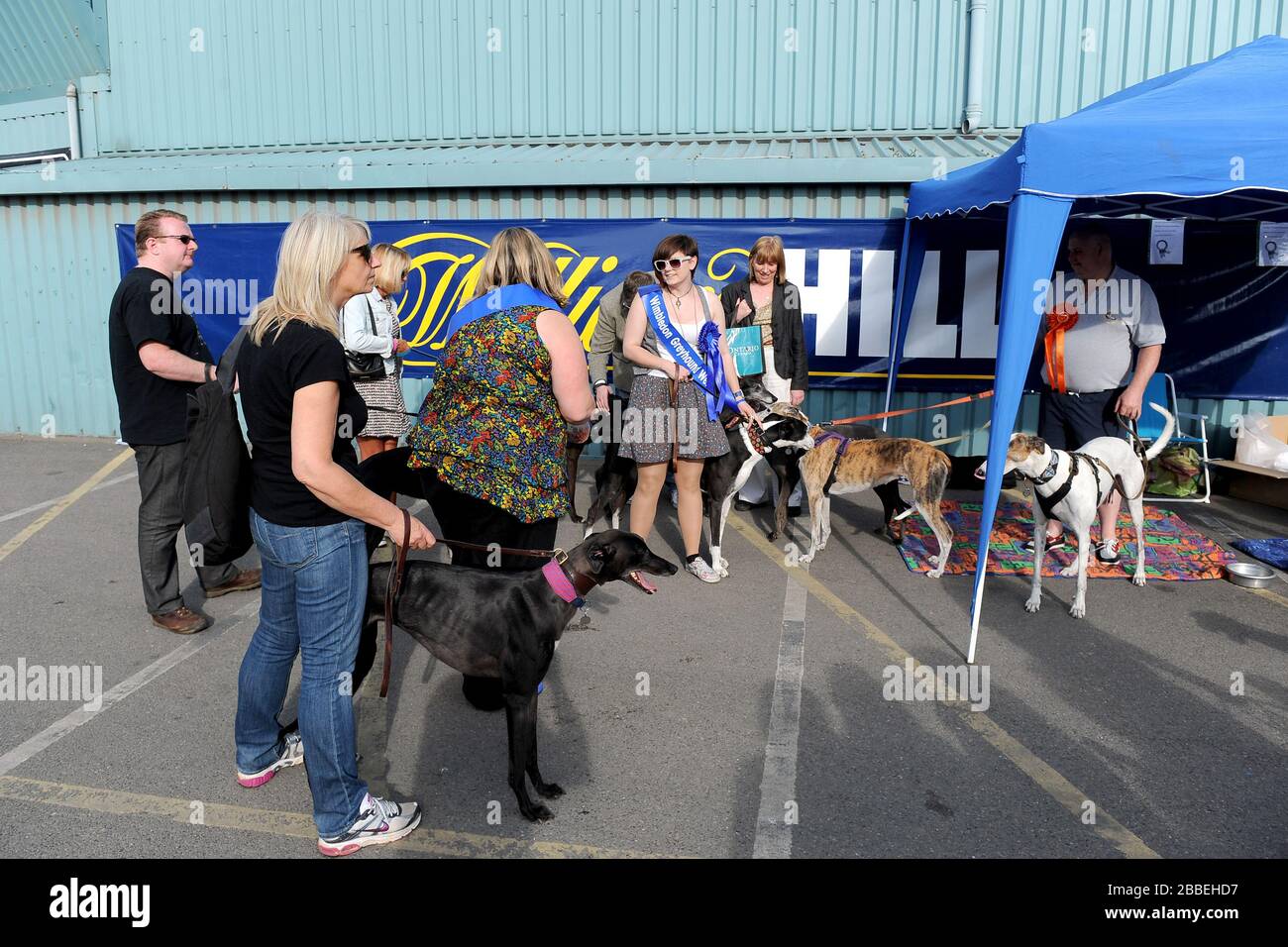 Spectators outside Wimbledon Stadium before the racing Stock Photo - Alamy
