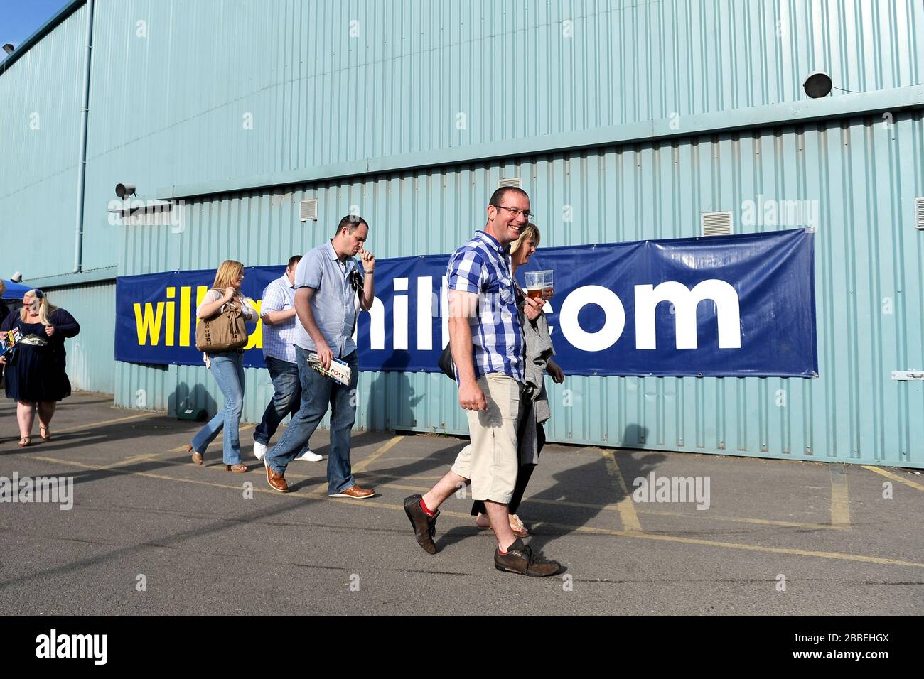 Spectators outside Wimbledon Stadium before the racing Stock Photo - Alamy