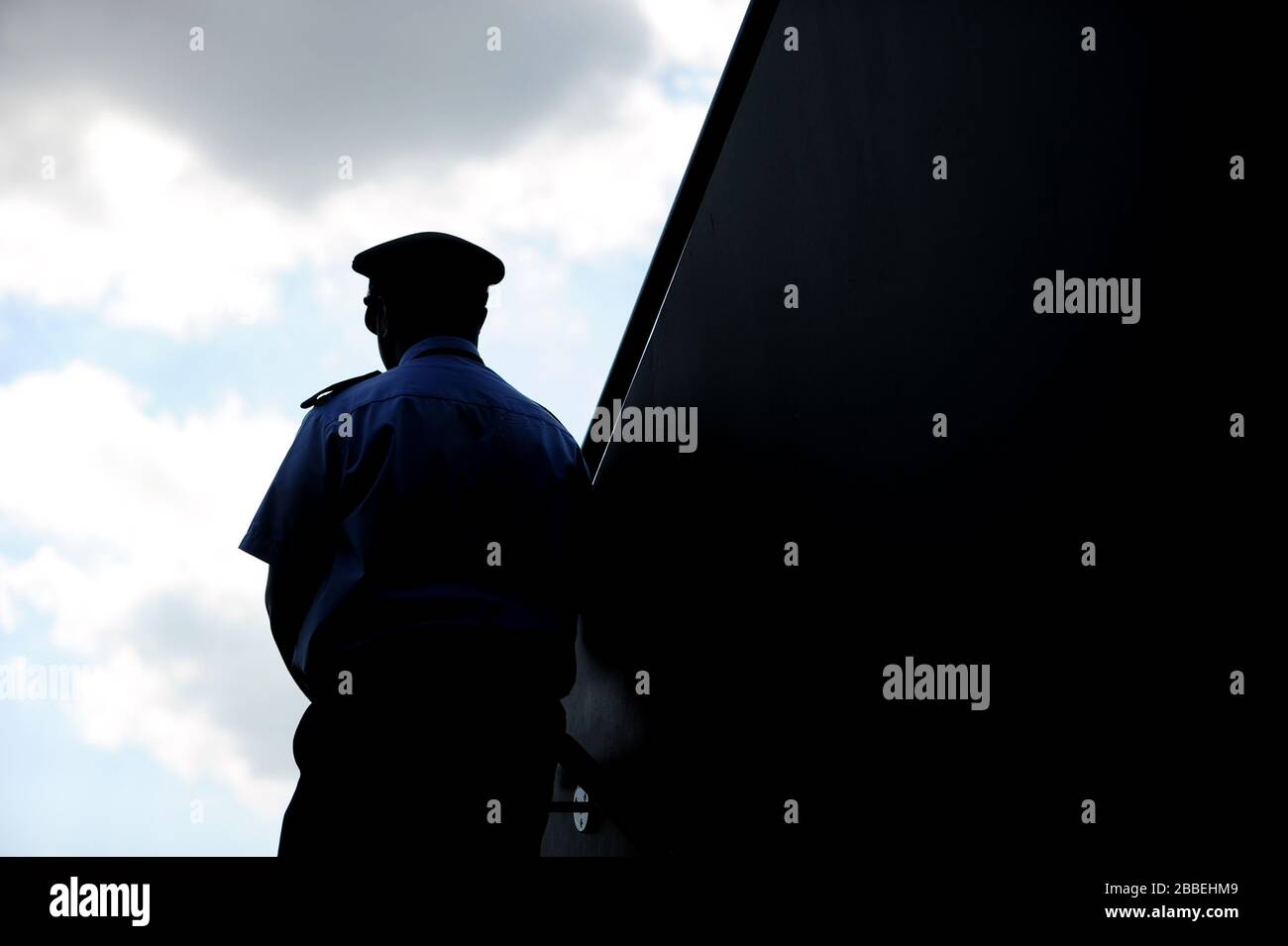 A security guard stands watch at Wimbledon Stock Photo - Alamy