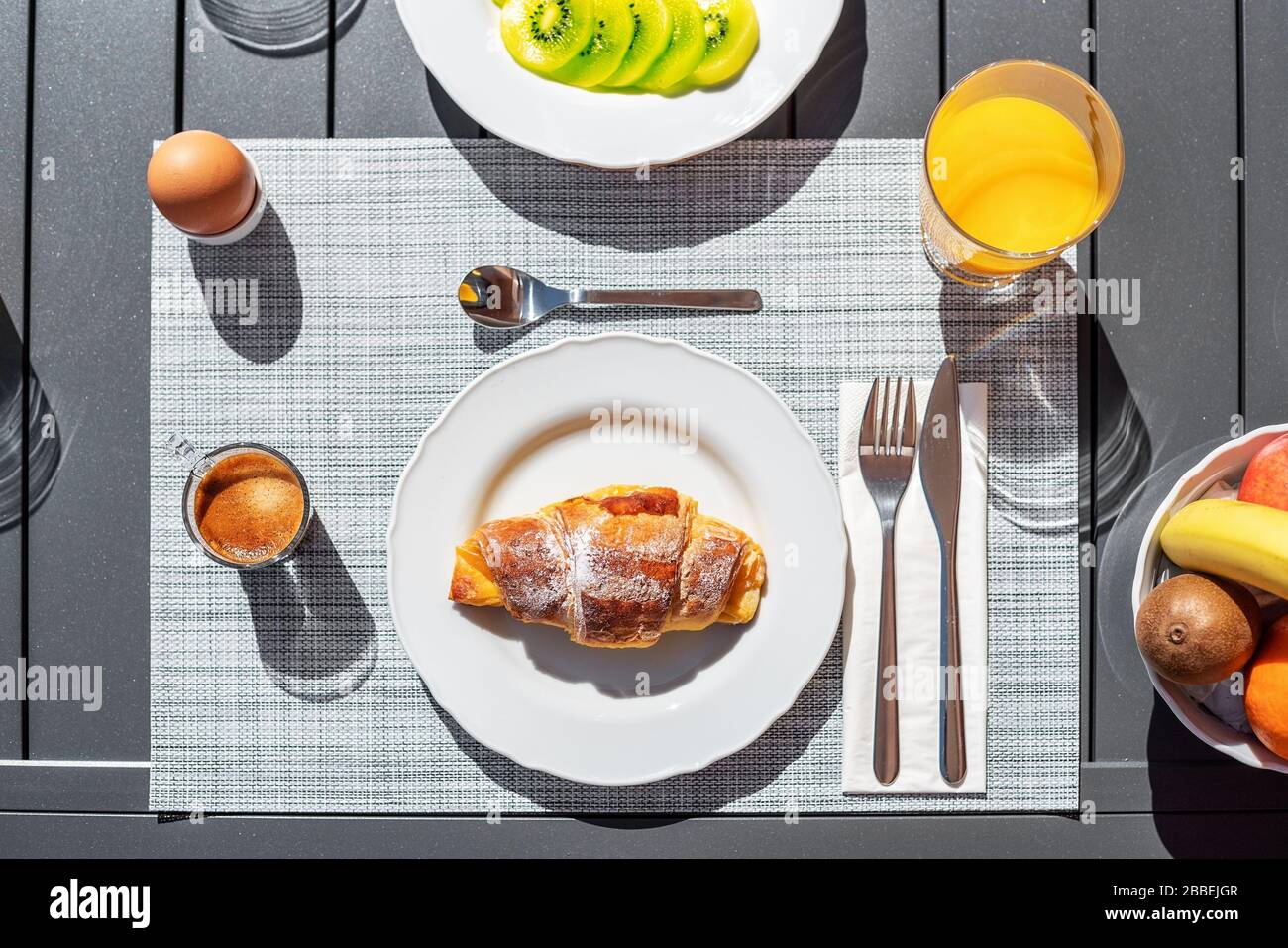 Healthy breakfast of fruits on a table on the outdoor. Flat lay Stock ...