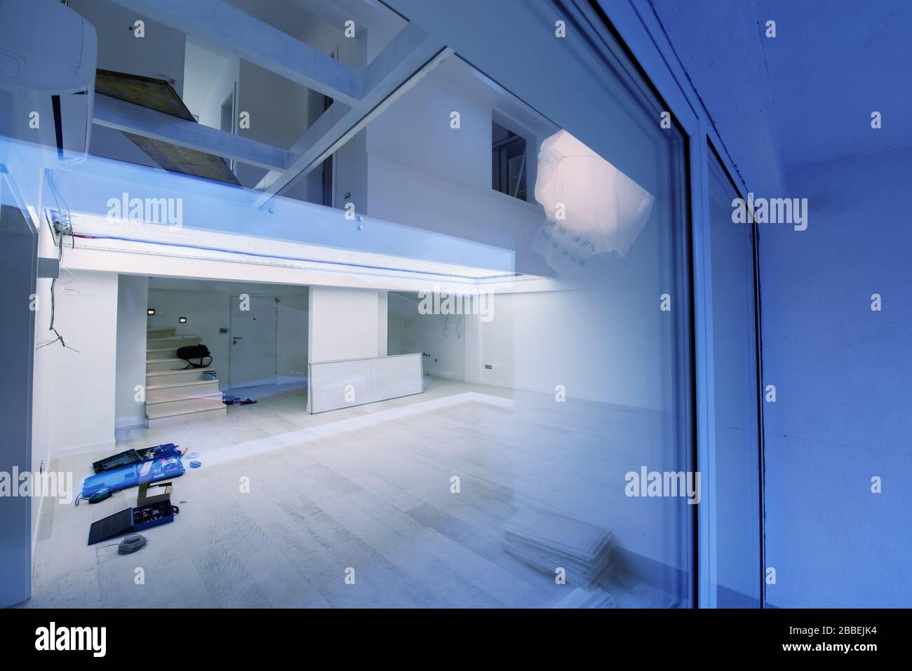 outside view trough window on interior of a luxury stylish modern open ...