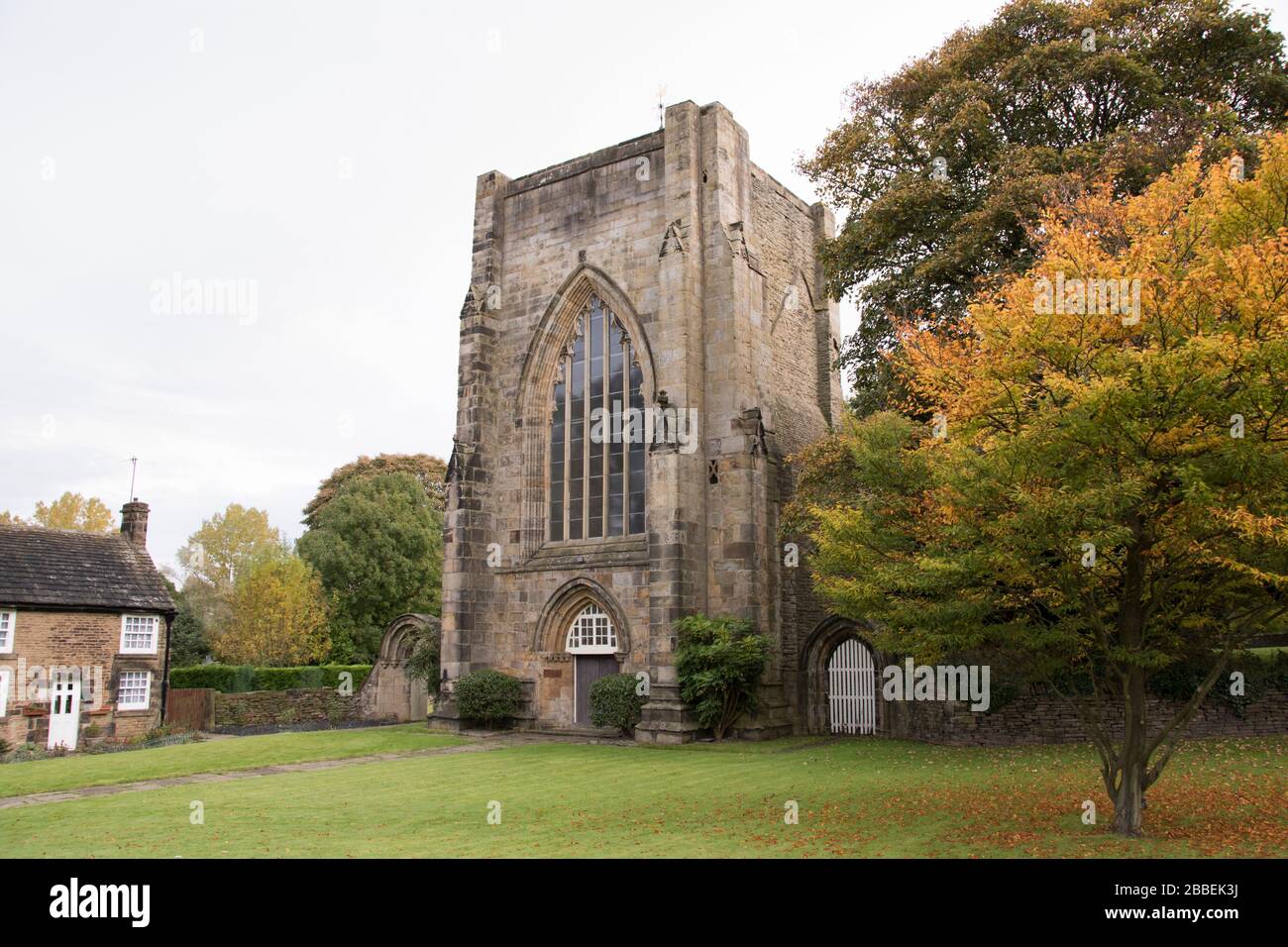 Sheffield, UK - Oct 21 2016 : Beauchief Abbey and the flaming orange ...