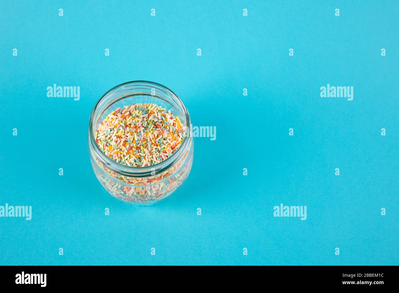 pot with colored sugar sticks Stock Photo - Alamy