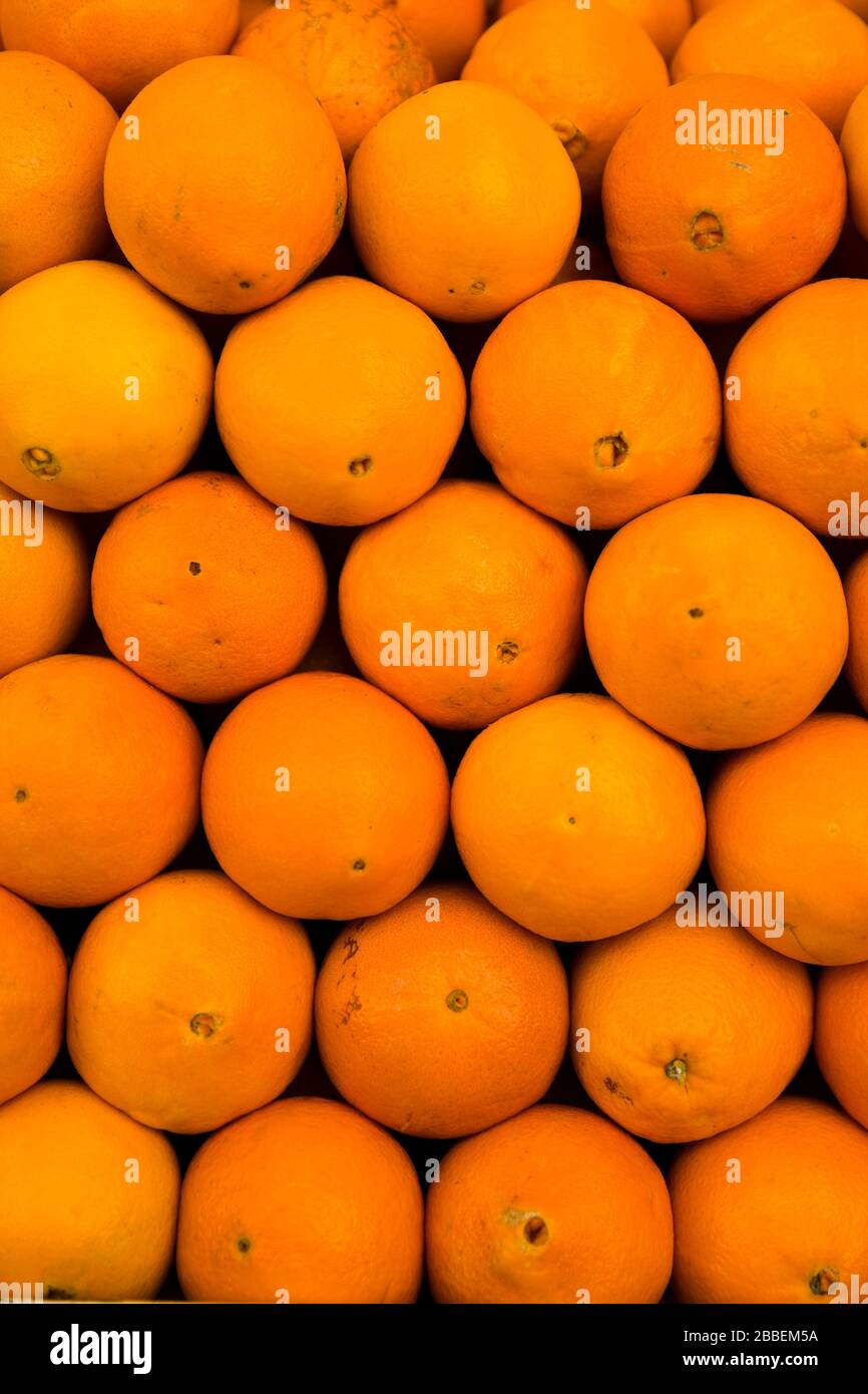 Sweet fresh and juicy oranges on the market Stock Photo - Alamy