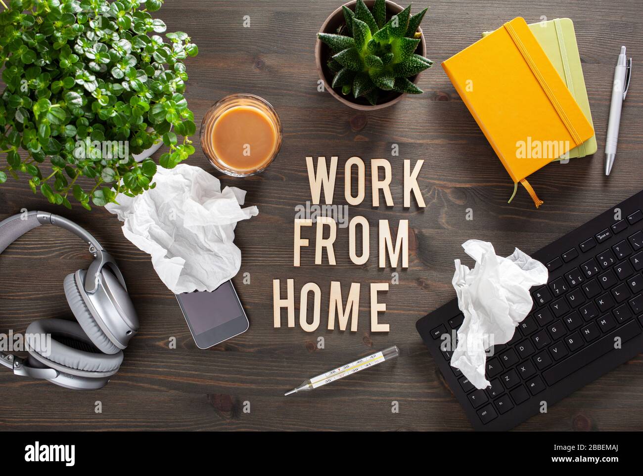 work from home text desk with keyboard computer smartphone notebook ...