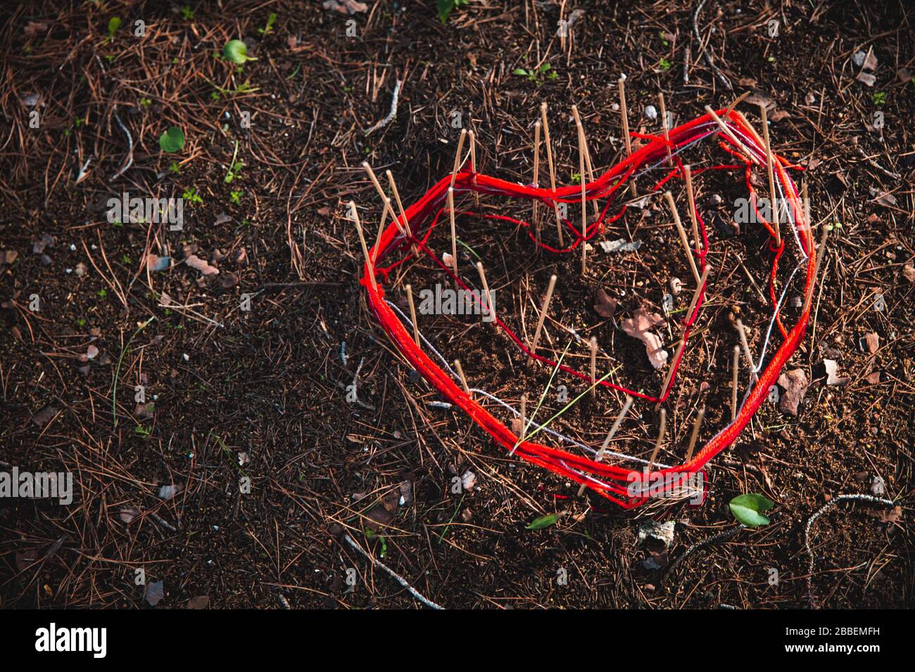 Heart Shaped Red Thread on the Ground Soil for Valentine's Day Stock ...