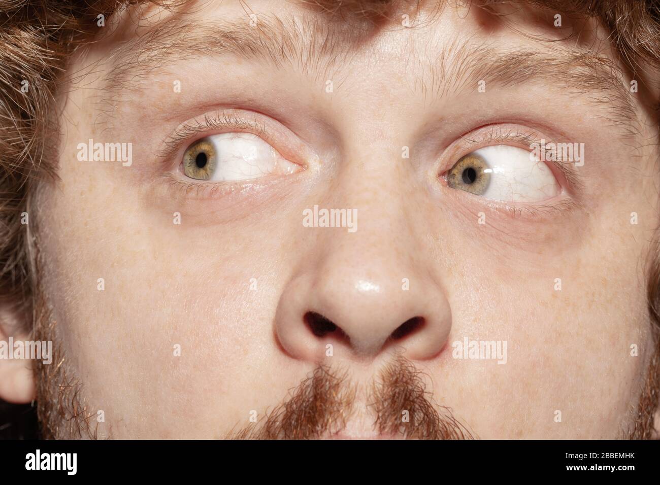 Asking at side. Close up of face of beautiful caucasian young man ...