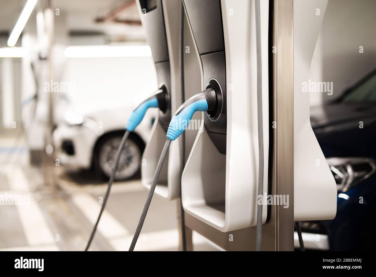 Electric cars at a charging station in an underground car park Stock ...