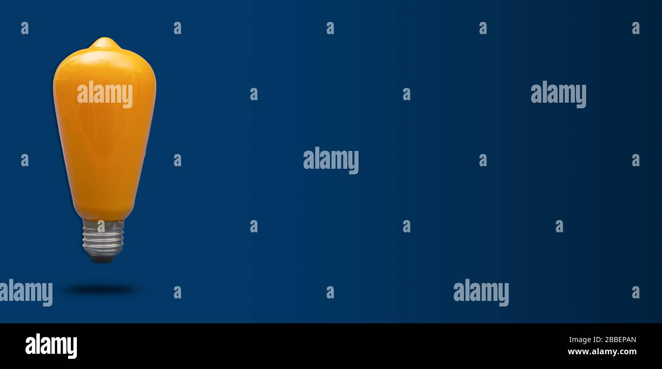 Idea conceptual bulb with blue banner Stock Photo - Alamy