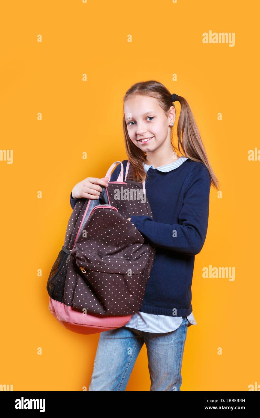 Young caucasian kid student with a backpack portrait Stock Photo - Alamy