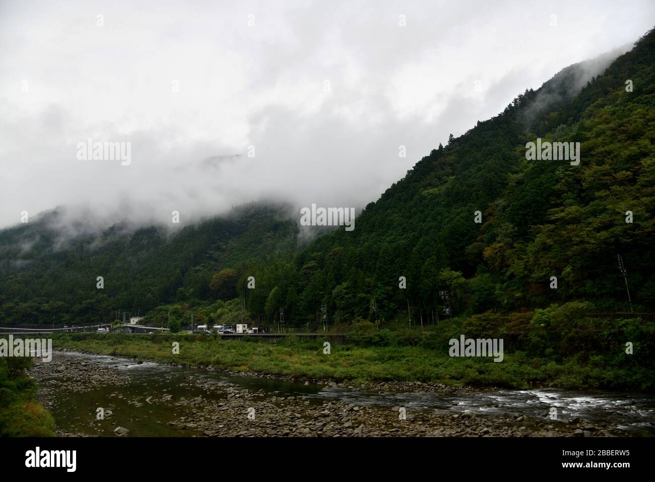 Lush green landscape along the Takayama Line and Hida River on the way ...