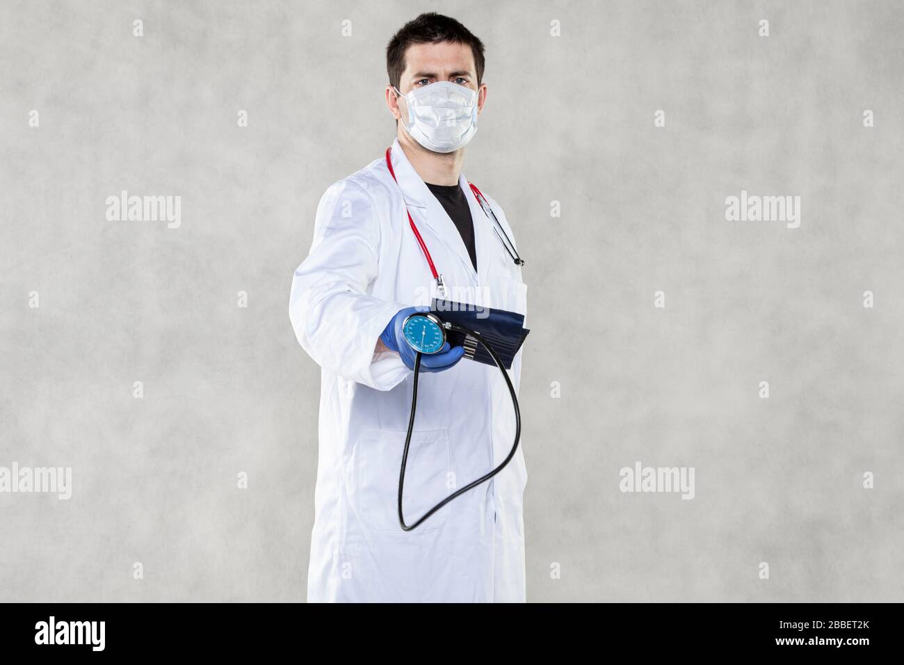 the doctor gives you a blood pressure monitor for you Stock Photo - Alamy