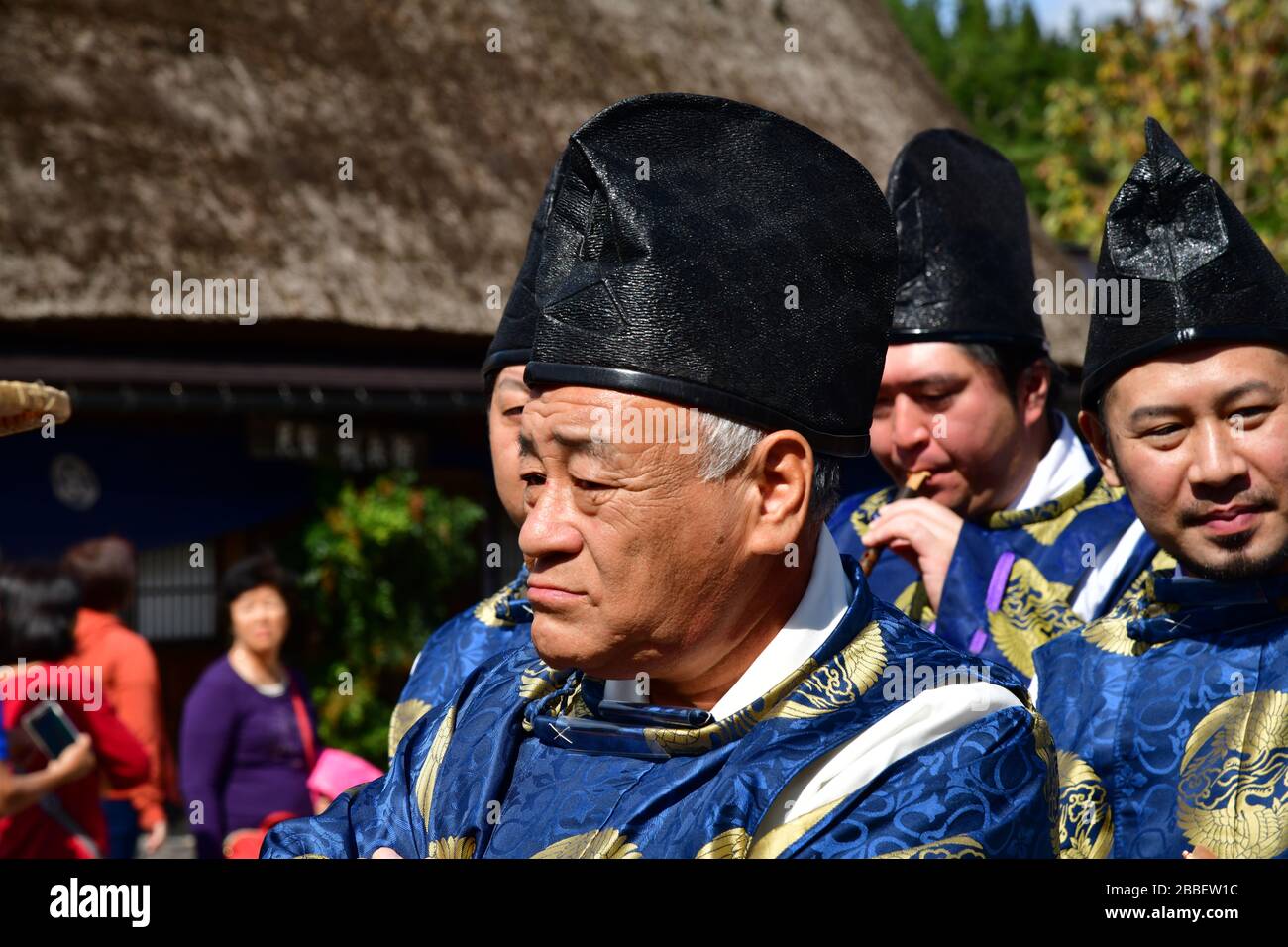 Close up of some man part of a scene of the Doburoku festival in the ...