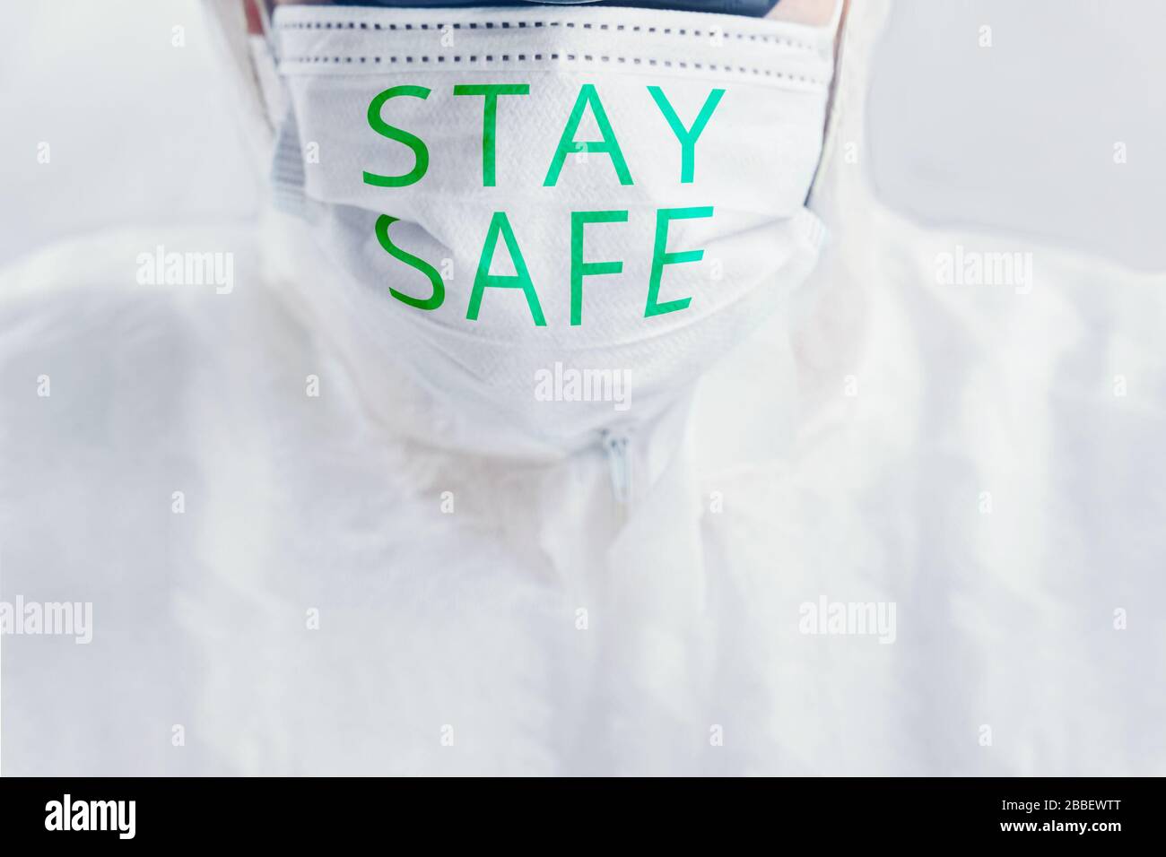 Virologist. Human bio suit and protective mask with the inscription ...