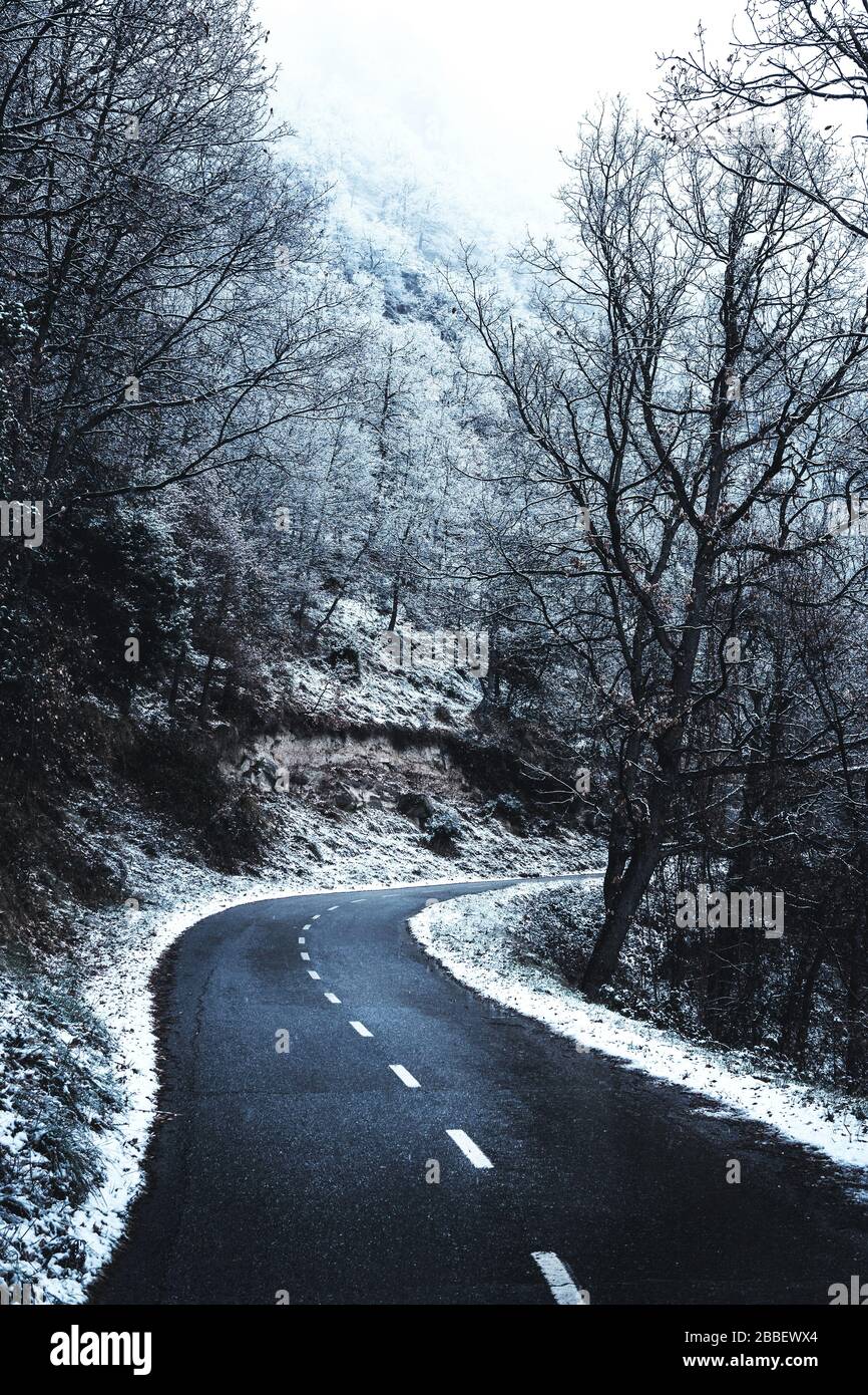 Snowy mountain road in winter, snowy road Stock Photo - Alamy