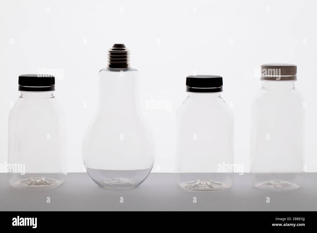 clean, empty plastic bottles on white background Stock Photo - Alamy