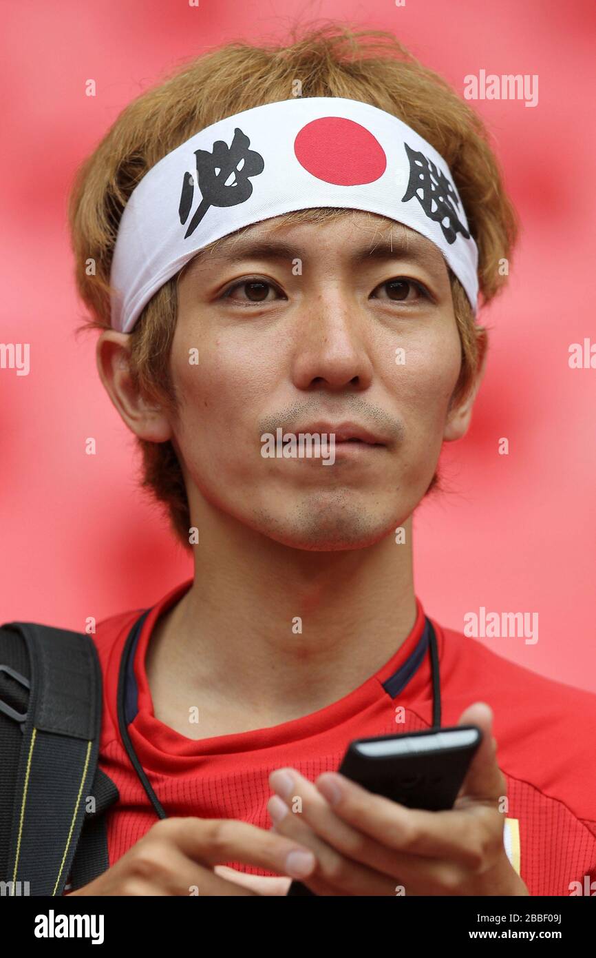 A Japanese fan is seen prior to kick-off Stock Photo - Alamy