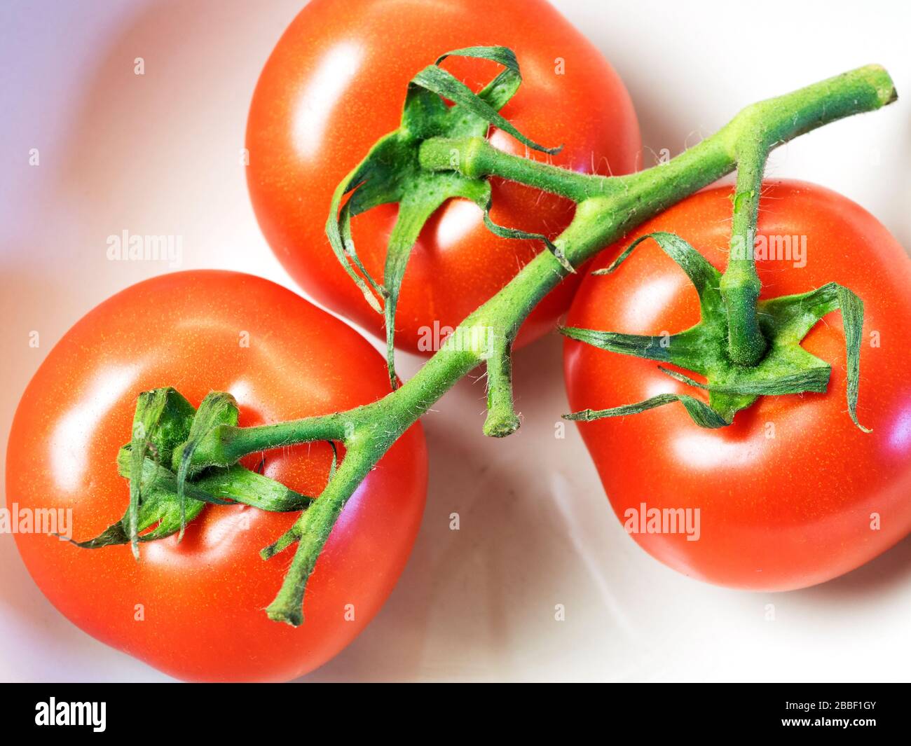 Five tomatoes hi-res stock photography and images - Alamy