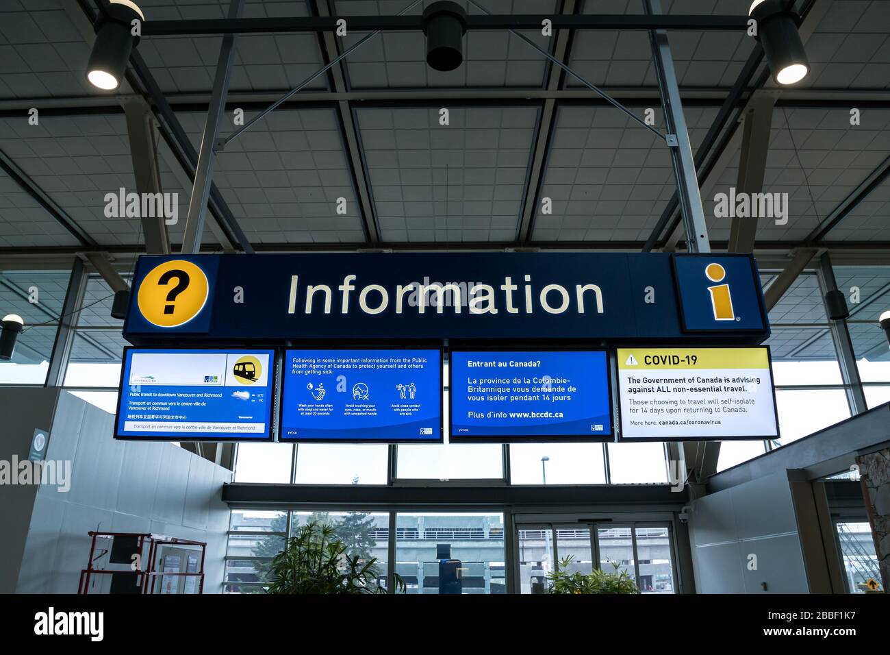 Check in sign yvr airport hi-res stock photography and images - Alamy