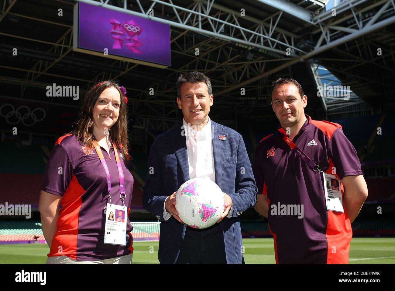 Lord Sebastian Coe poses with volunteers Derek and Gemma. Lord Coe ...