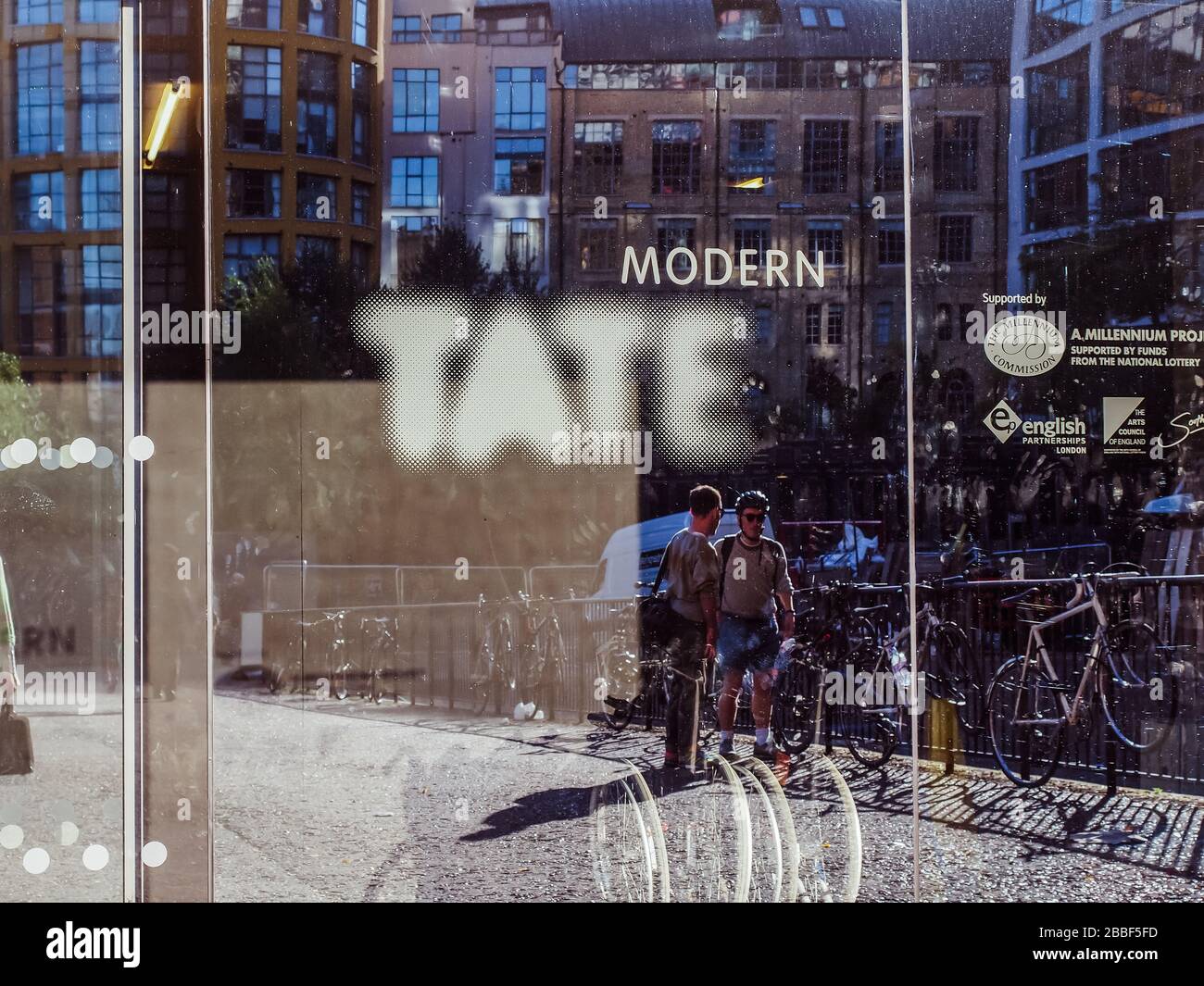 Glass door entrance of the Tate Modern, national museum of modern and ...