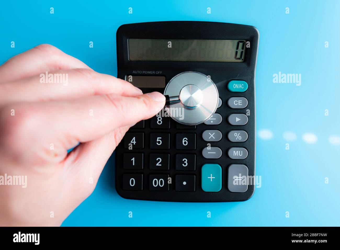 Calculator and stethoscope on financial statement concept for finance ...