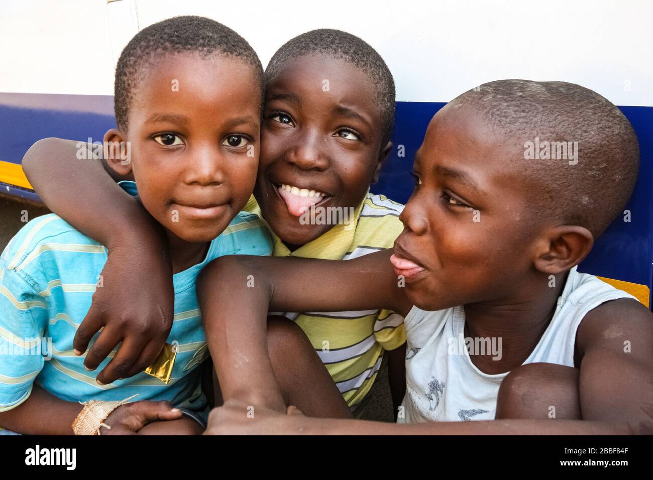 Soweto, South Africa - September 11, 2009: Three young African boys ...