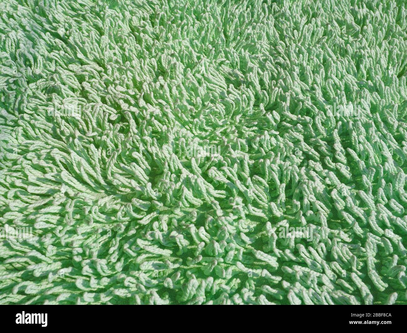 green carpet texture useful as a background Stock Photo - Alamy