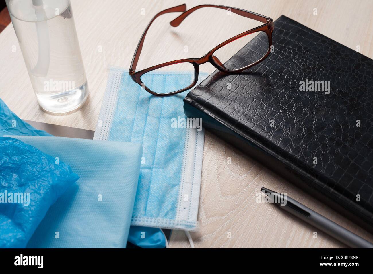 Empty notepad on hospital desk surrounded by medical equipment. Top ...
