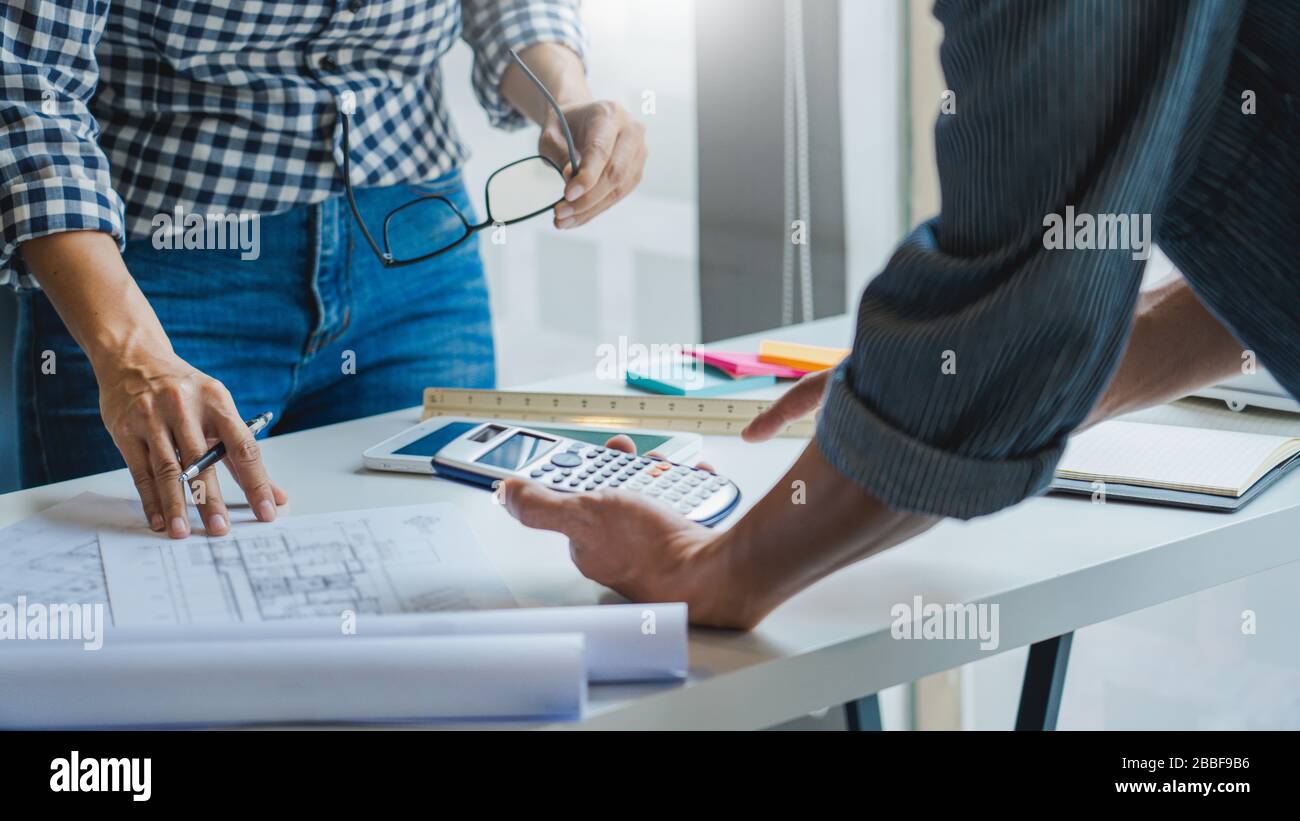 engineer Hand Drawing Plan On Blue Print with architect equipment ...