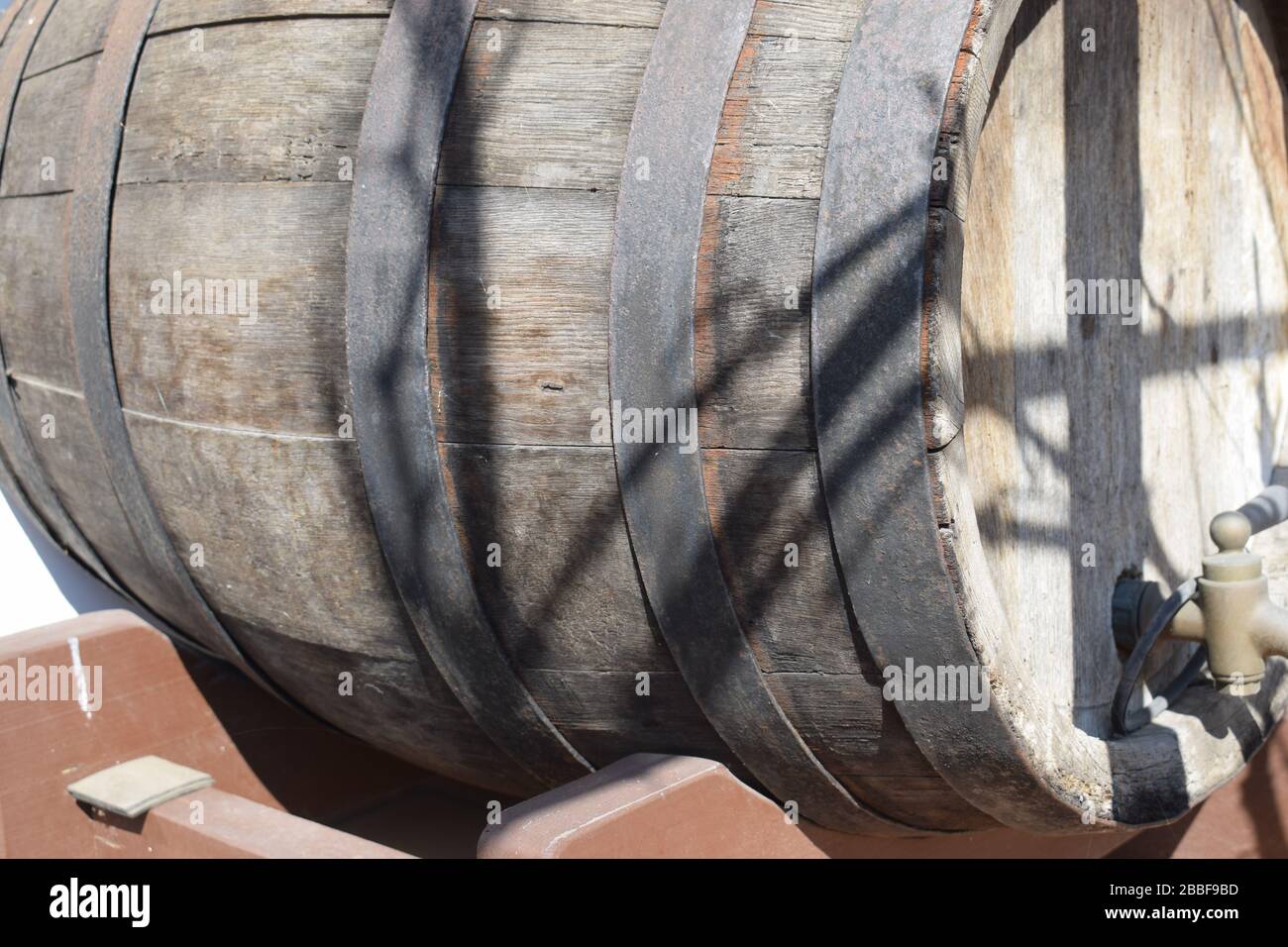 old wine barrel residing outside Stock Photo - Alamy