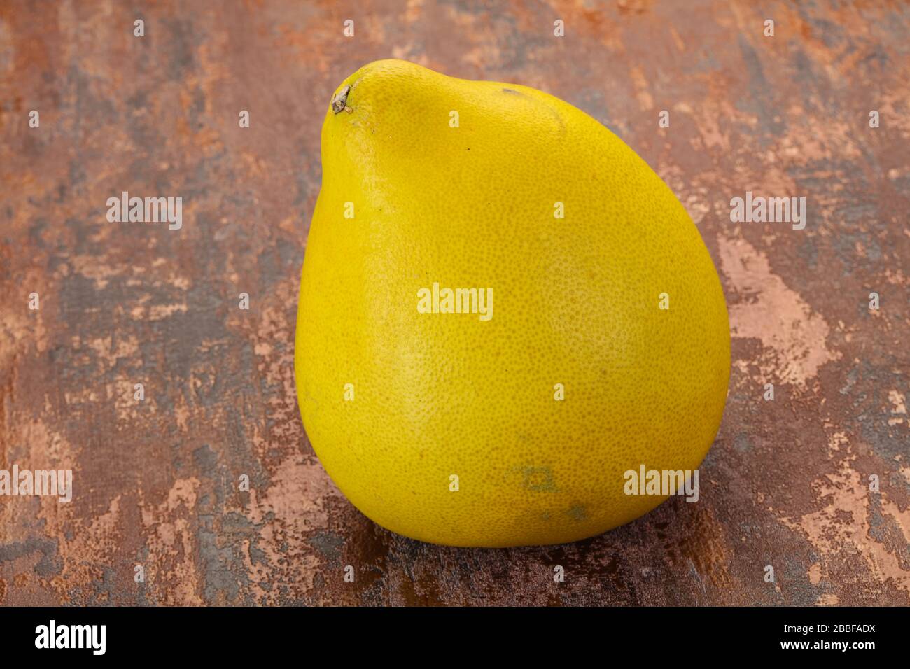 Ripe fresh Pomelo fruit over the wooden background Stock Photo - Alamy