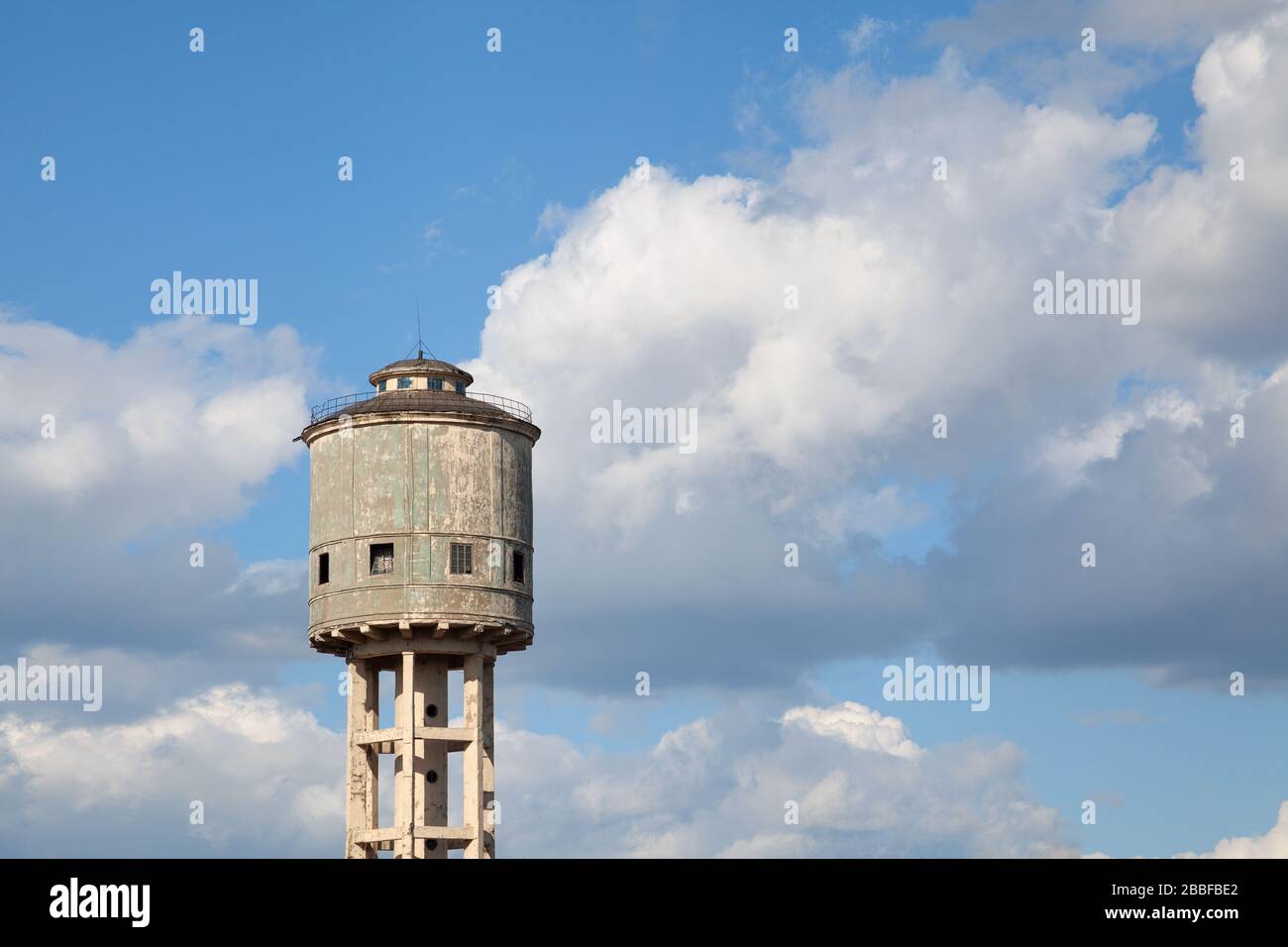 Water tower against the sky with clouds Stock Photo - Alamy